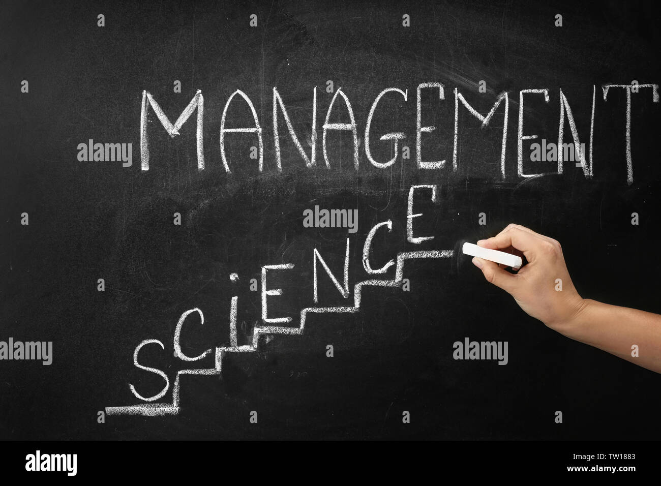 Hand writing phrase MANAGEMENT SCIENCE on blackboard Stock Photo - Alamy