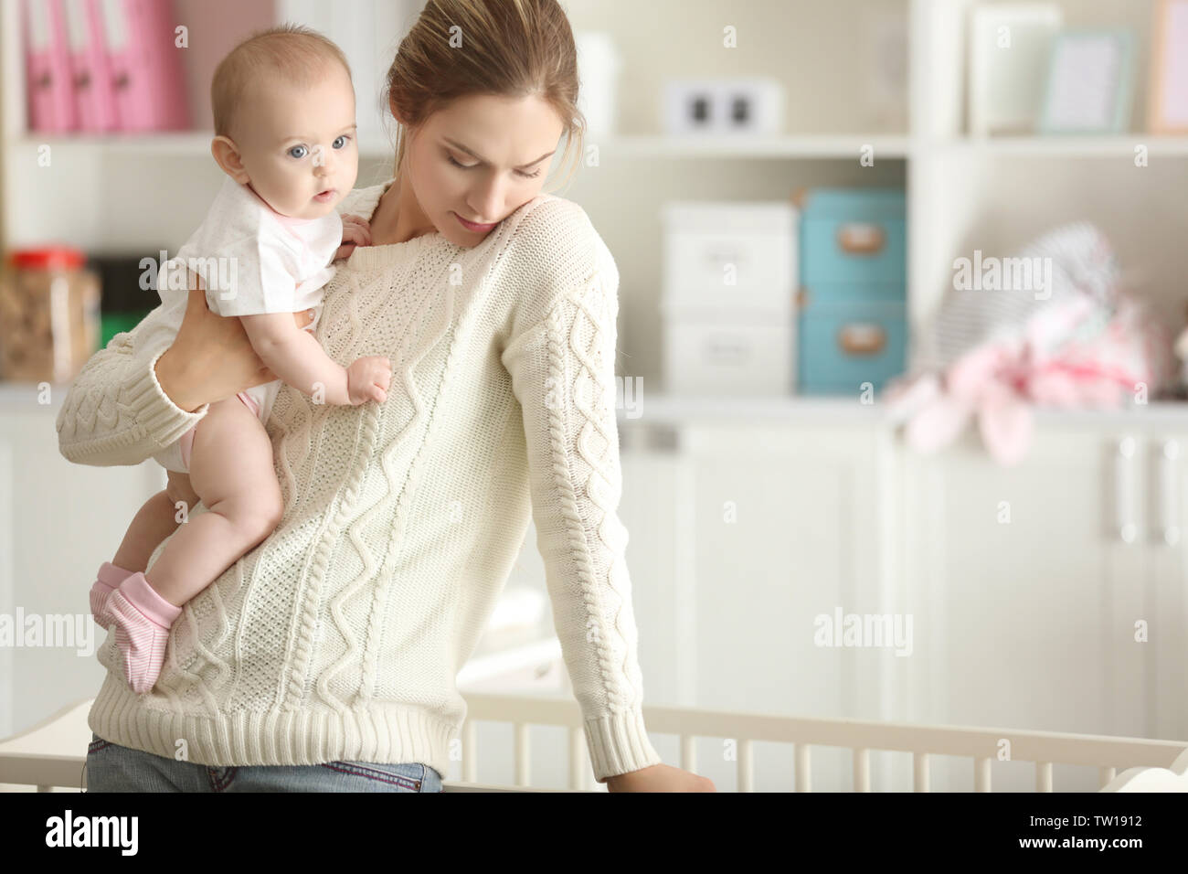Depressed mother and infant hi-res stock photography and images - Alamy