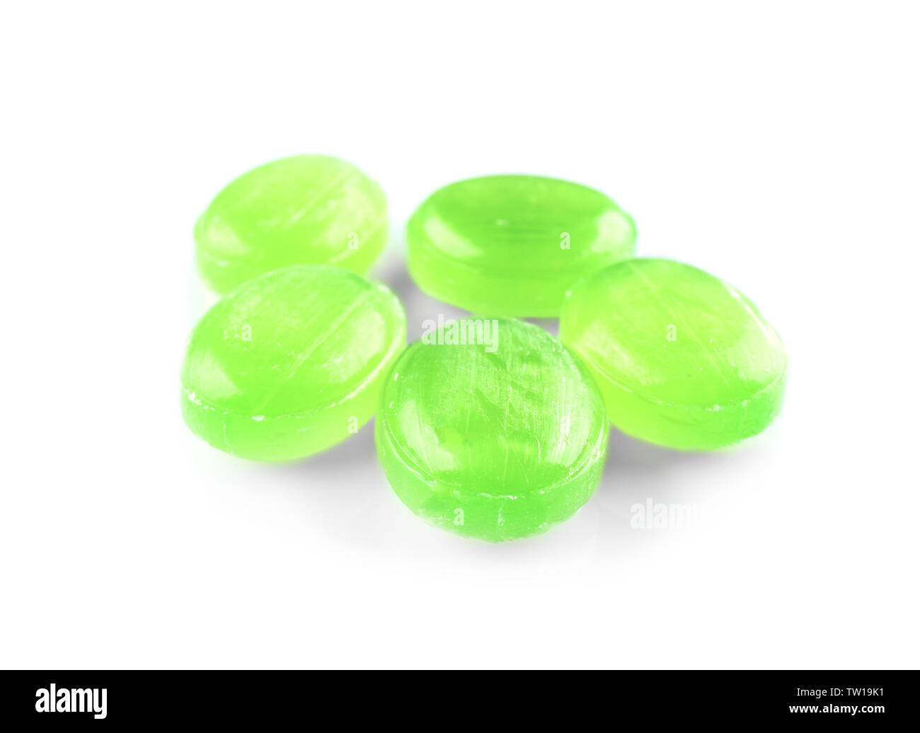 Cough drops on white background Stock Photo - Alamy