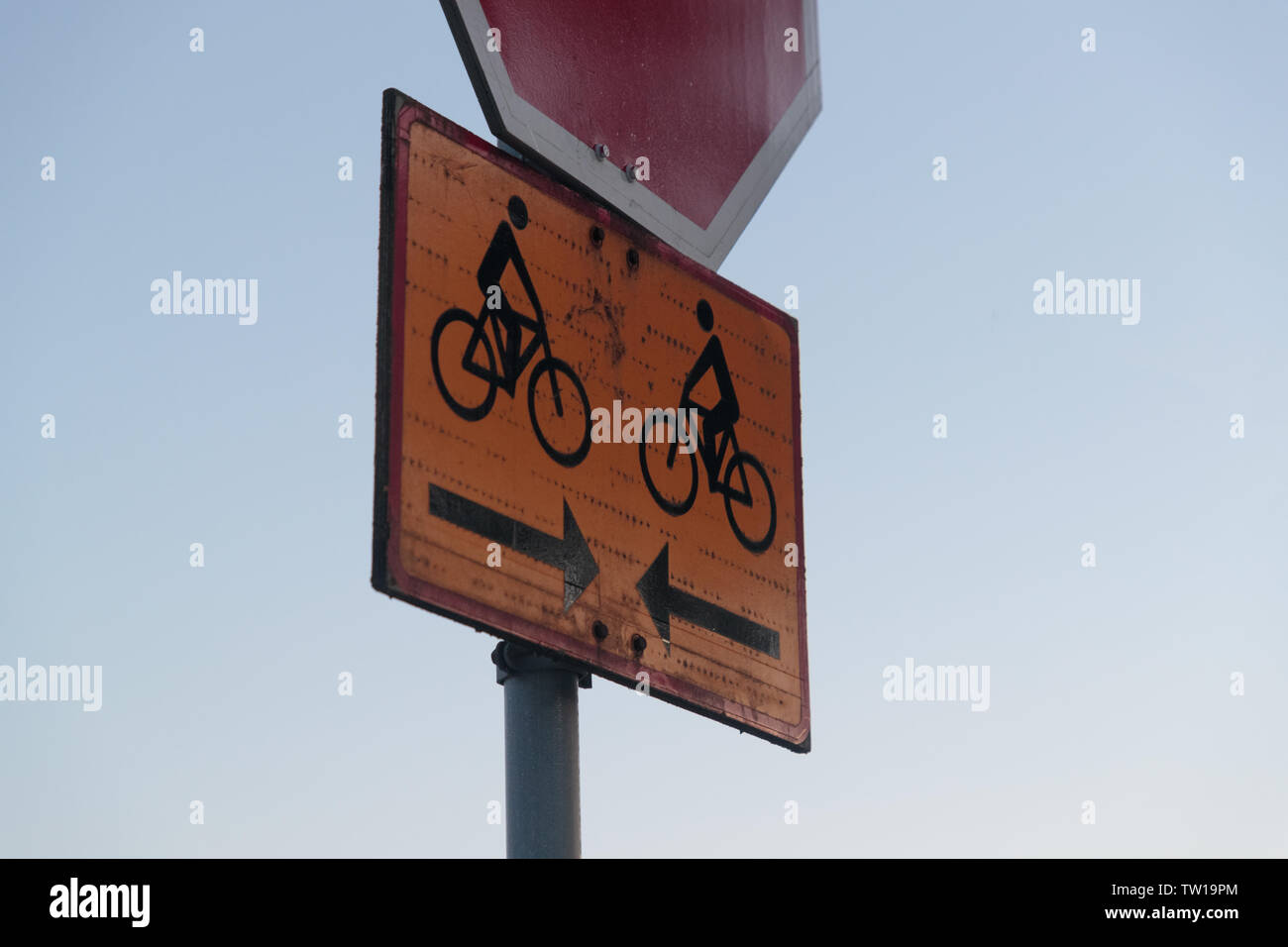 road stop sign and cyclist traffic Stock Photo - Alamy