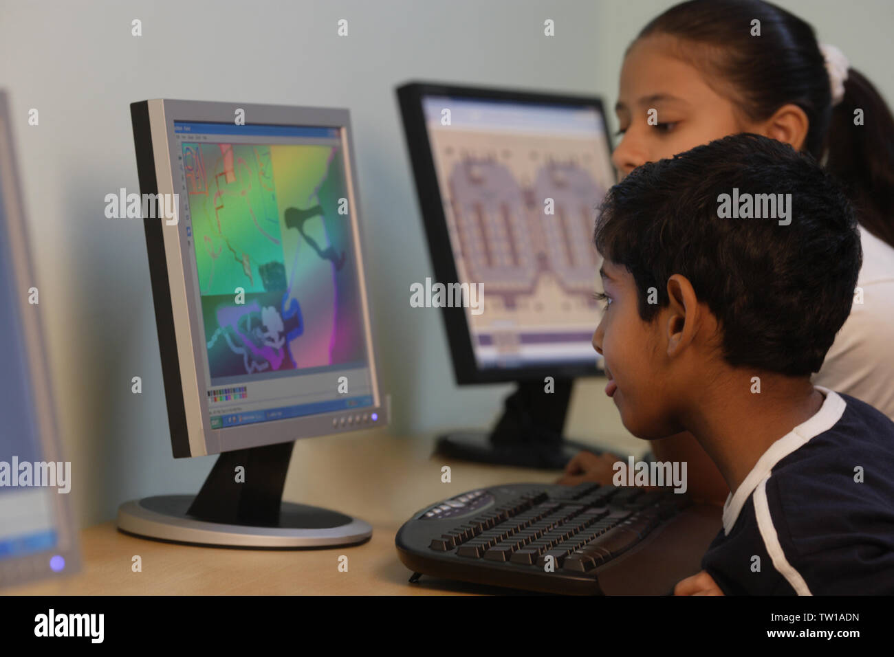 Students using computer in a classroom Stock Photo - Alamy