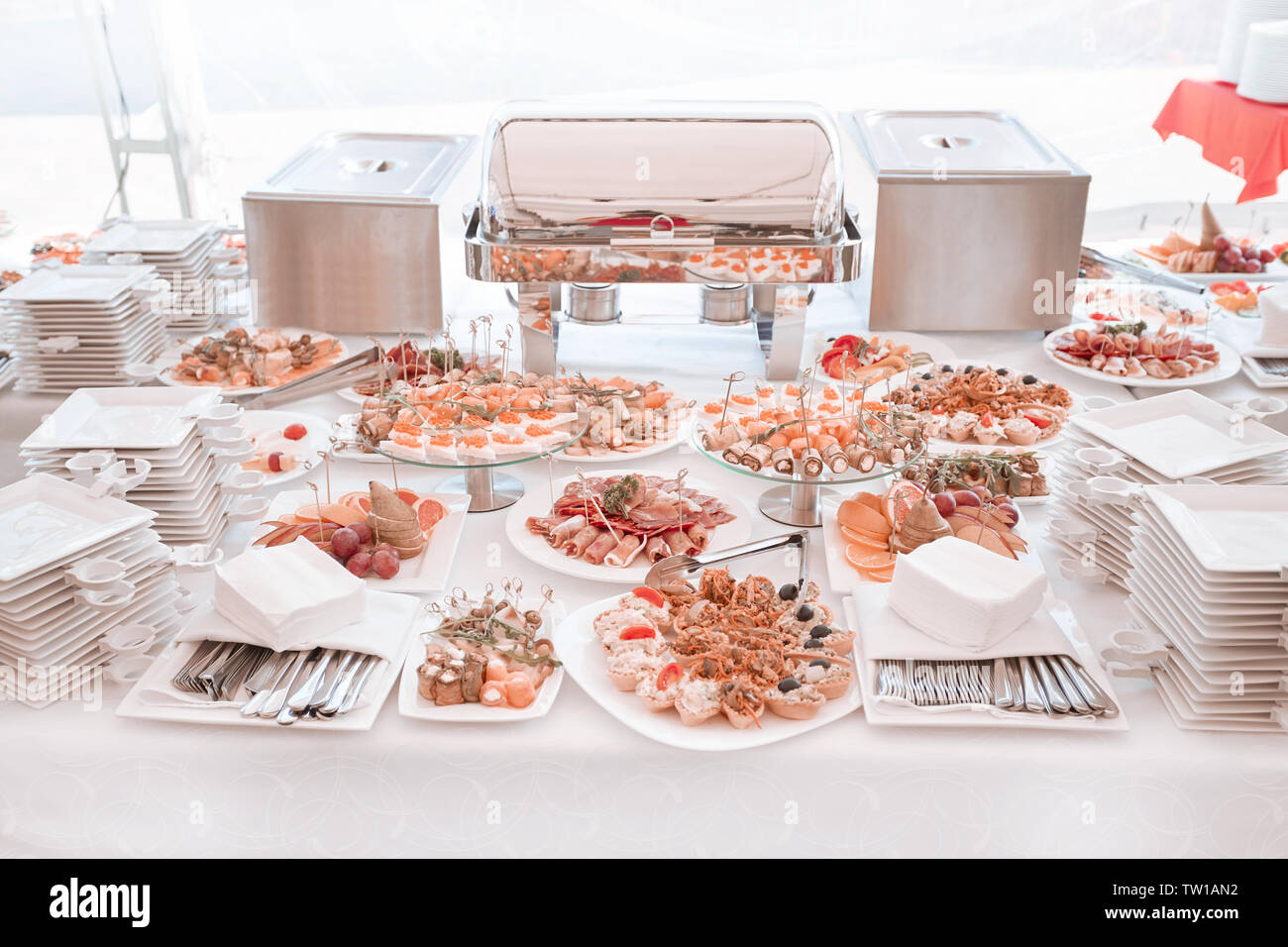 variety of snacks and dishes on the table in the modern restaurant ...