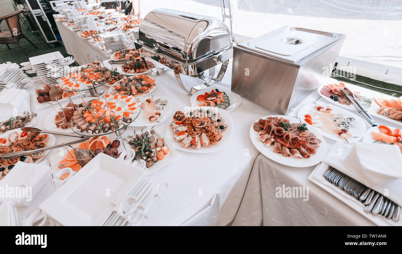 buffet table with a variety of dishes in the modern restaurant Stock ...
