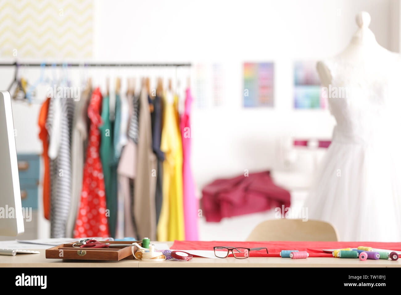 Modern interior of fashion designer workplace Stock Photo - Alamy