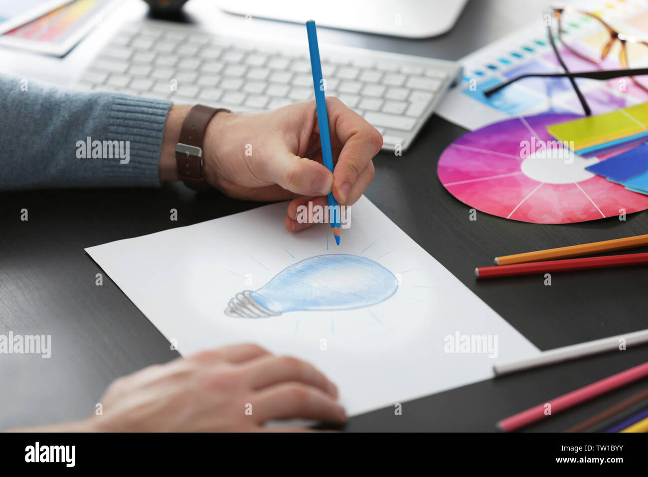 Male designer drawing hi-res stock photography and images - Alamy