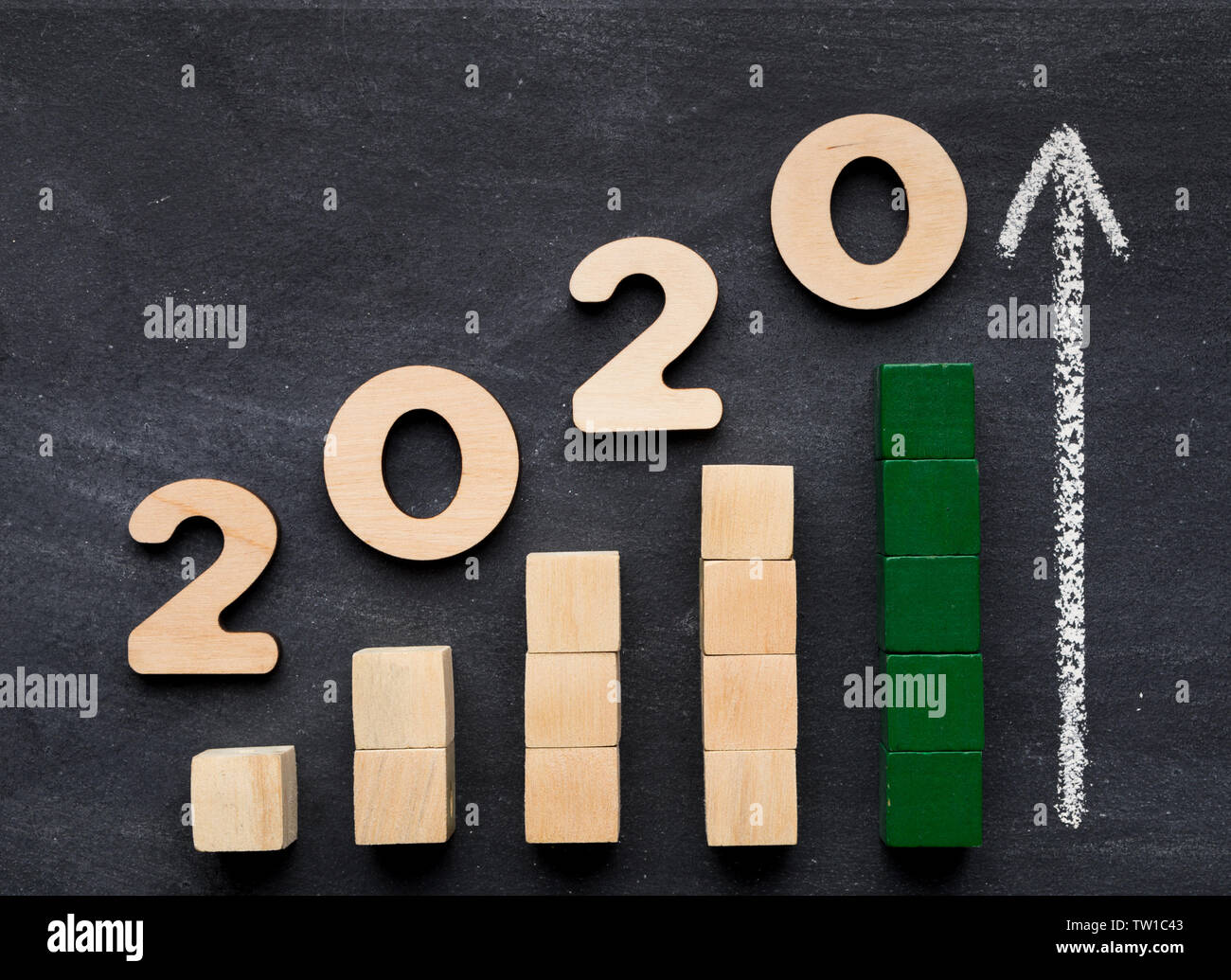 2020 concept. Graph of economics growth on chalk board, empty space ...