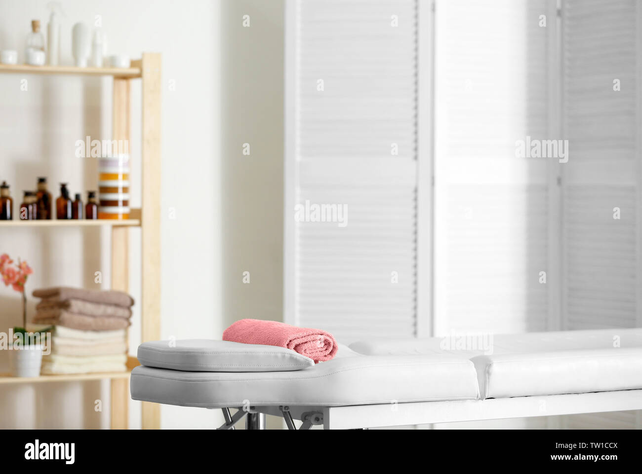 Interior of massage room in modern wellness center Stock Photo - Alamy