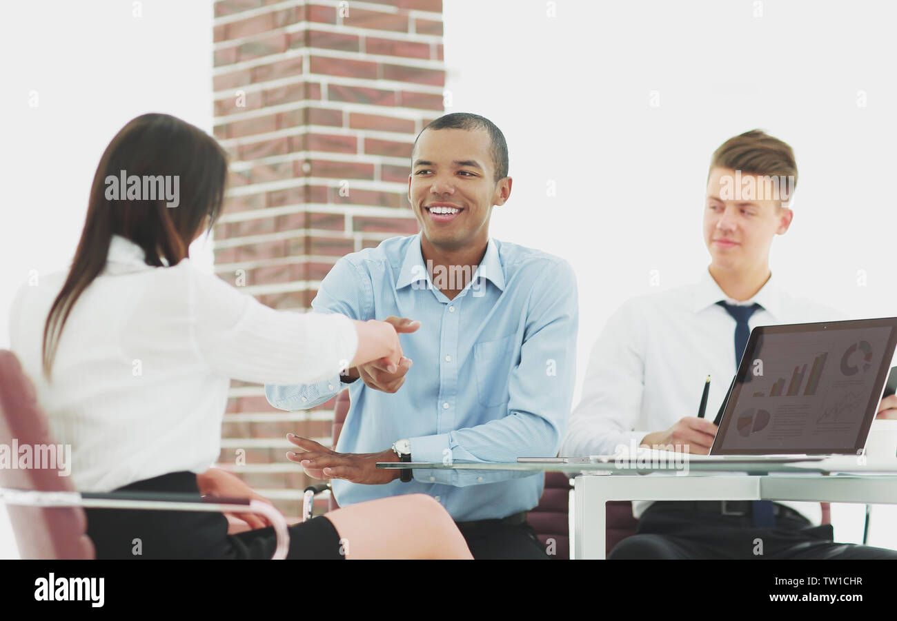 closeup.a handshake of a Manager and employee in the office.business ...