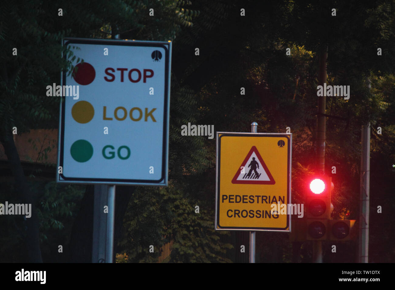 Stoplight and road signs Stock Photo - Alamy