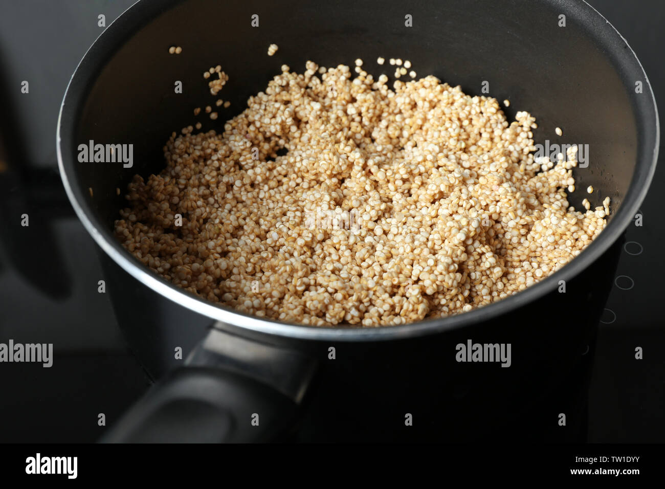 Cooking process of quinoa seeds, closeup Stock Photo - Alamy