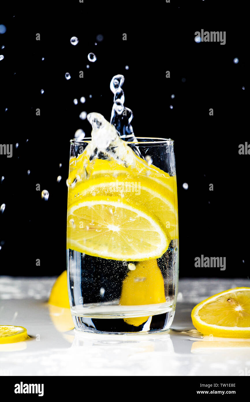 Splash clear lemonade Stock Photo - Alamy