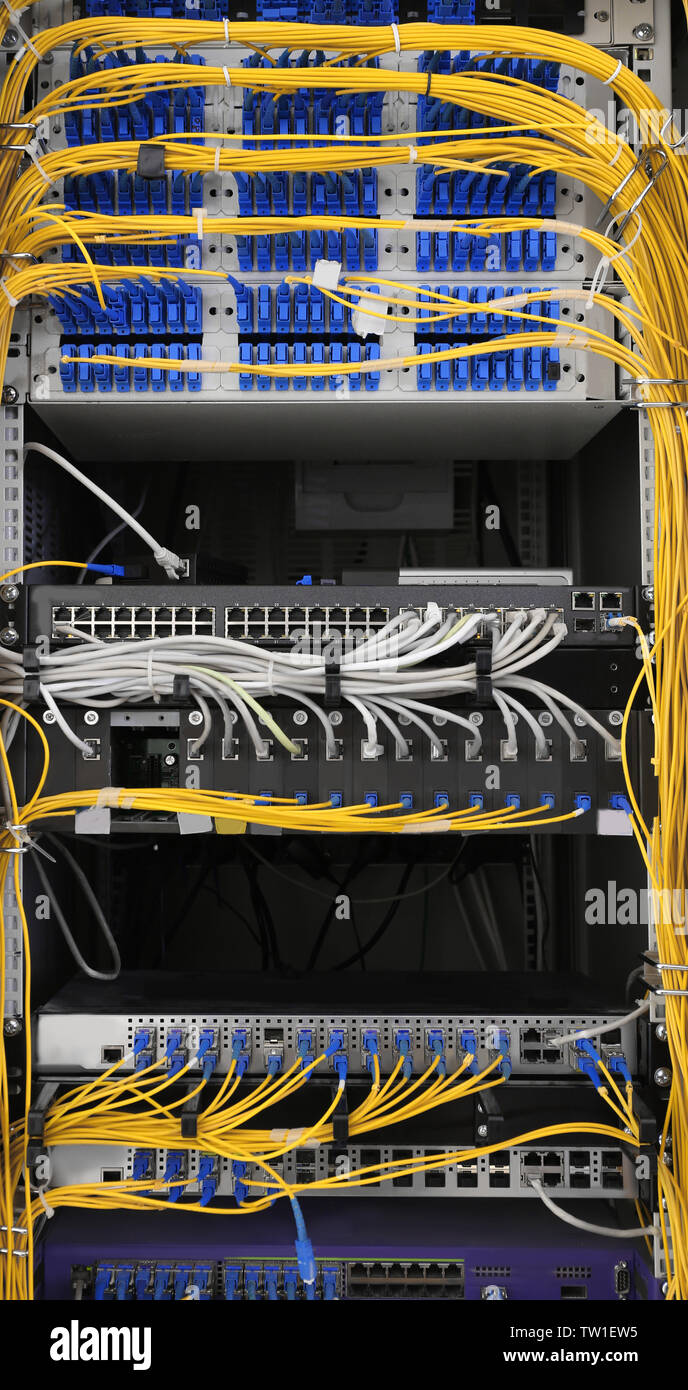 View of open cabinet with wires in server room Stock Photo - Alamy