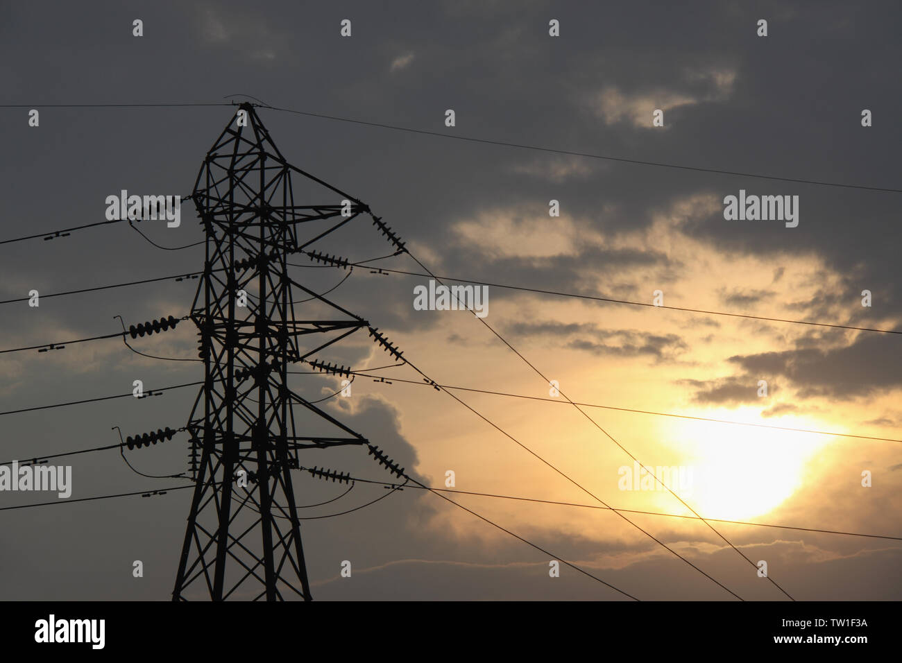 Low angle view of an electricity pylon, India Stock Photo - Alamy