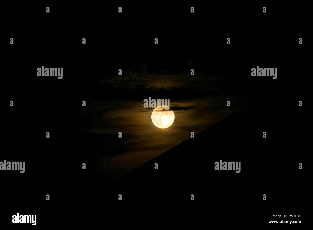 Full moon rising up over hi-res stock photography and images - Alamy