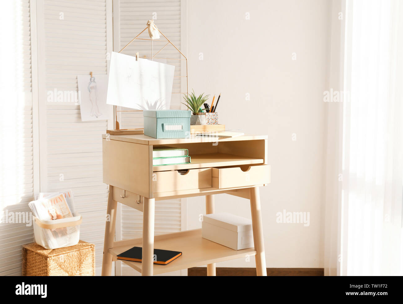 High wooden table as stand up work place in modern interior Stock Photo ...