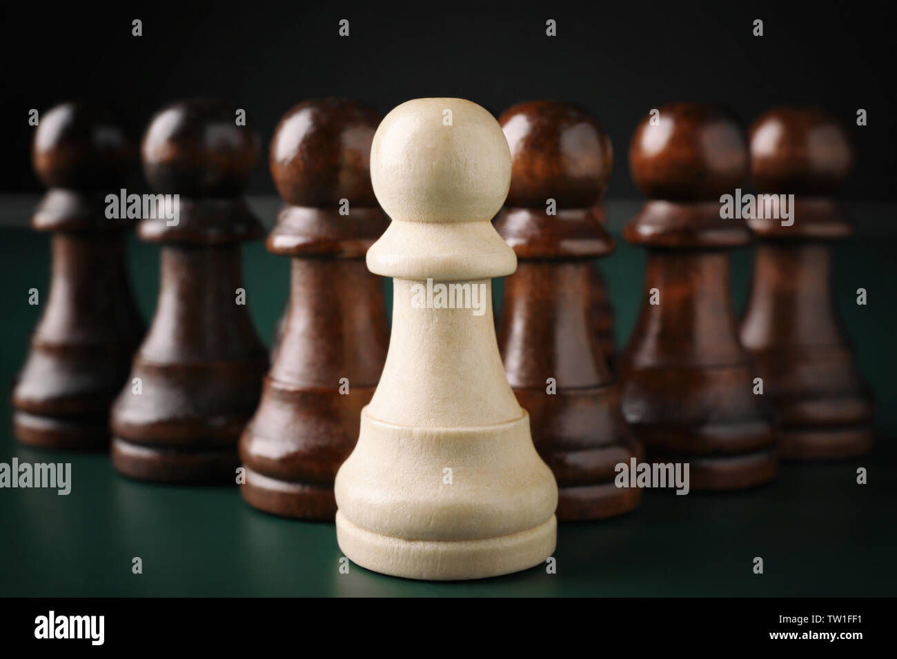 Boss vs Leader concept. Chess pieces on green background Stock Photo ...