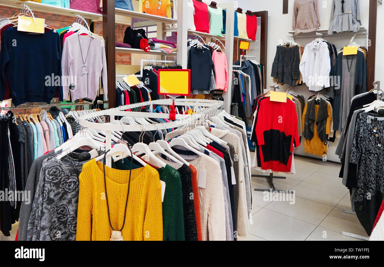 Fashionable and modern clothes for men and women hi-res stock ...