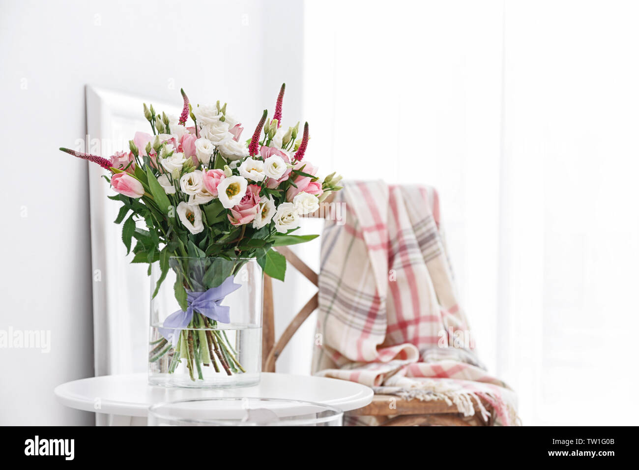 Interior design of room with beautiful flowers Stock Photo - Alamy