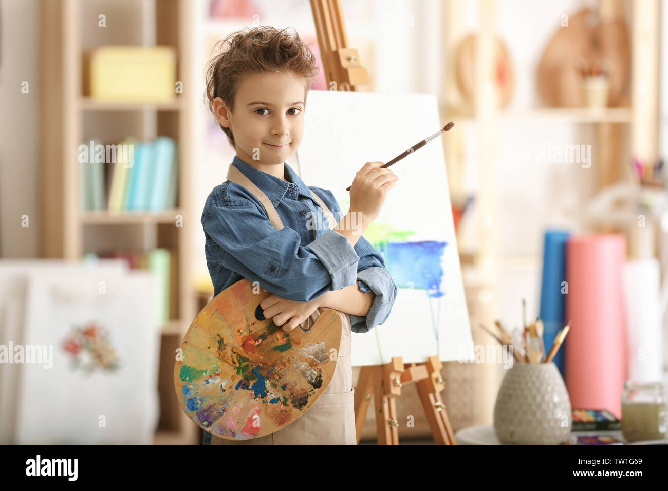 Cute little artist in studio Stock Photo - Alamy
