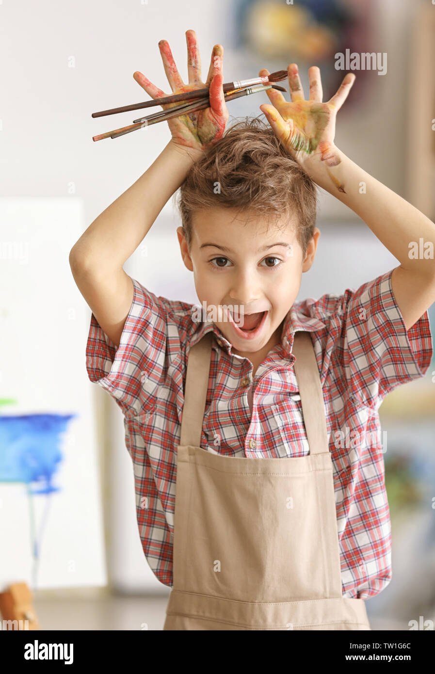 Cute little artist in studio Stock Photo - Alamy