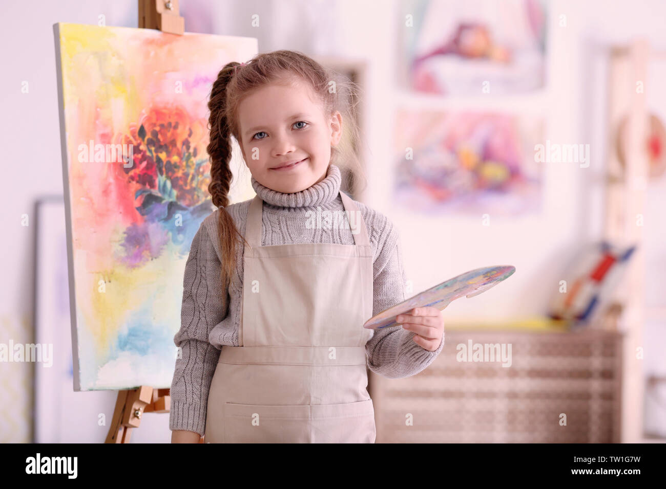 Cute little artist in studio Stock Photo - Alamy