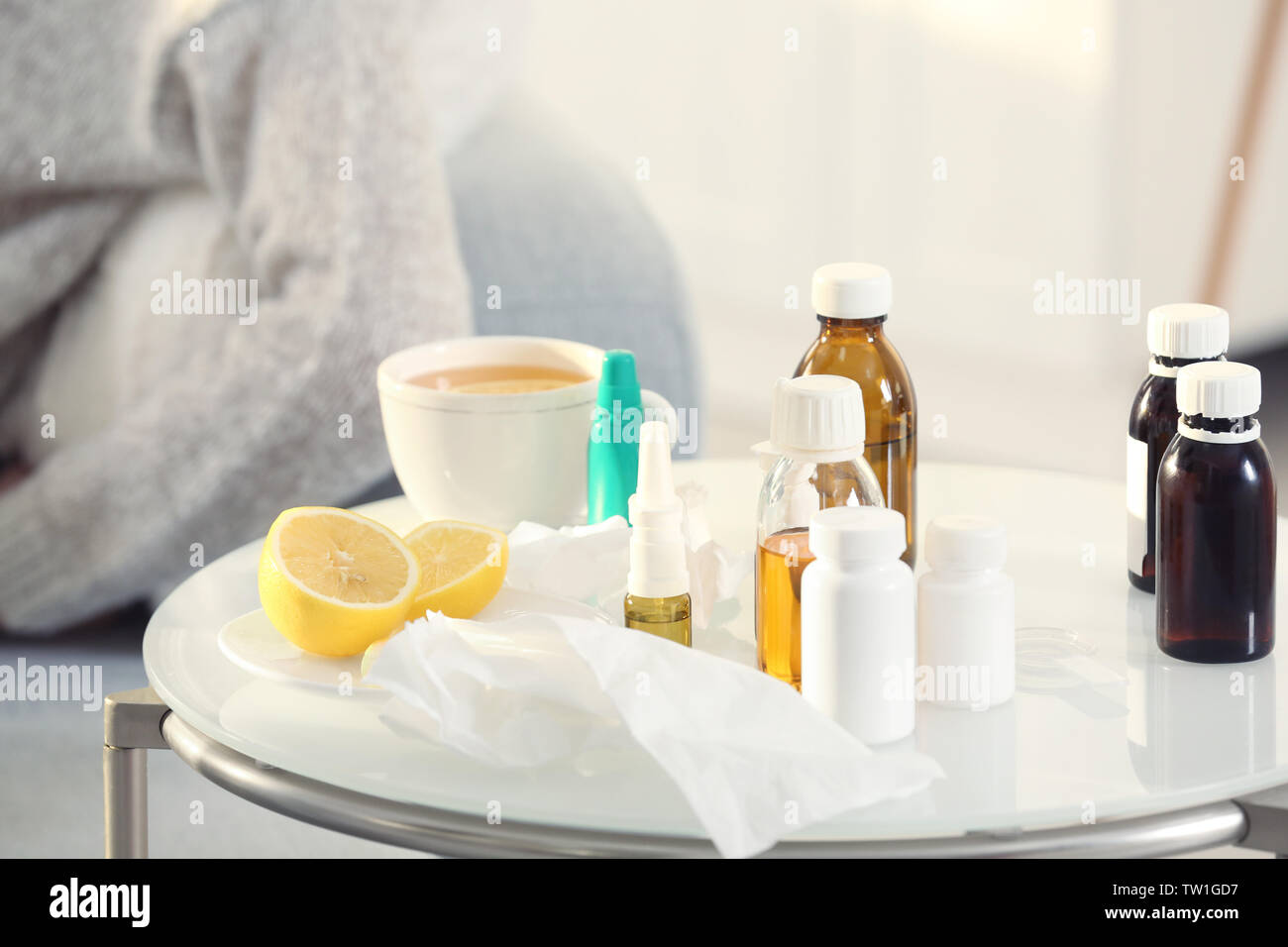 Medicines for cold on table indoors Stock Photo - Alamy