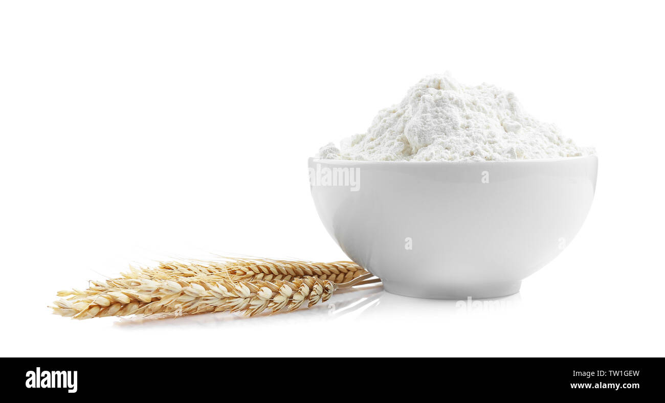 Bowl with flour on white background Stock Photo - Alamy