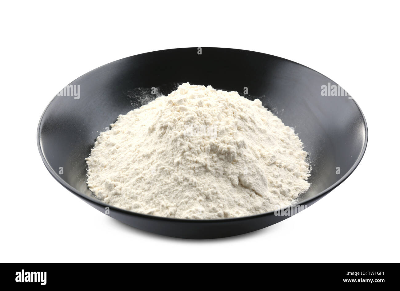 Pile flour on black background Cut Out Stock Images & Pictures - Alamy