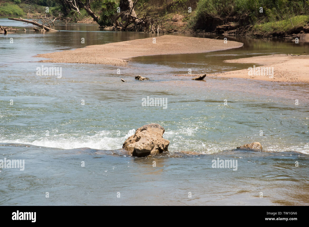 Daly River scene with native bushland and sandy shore in Daly in the ...