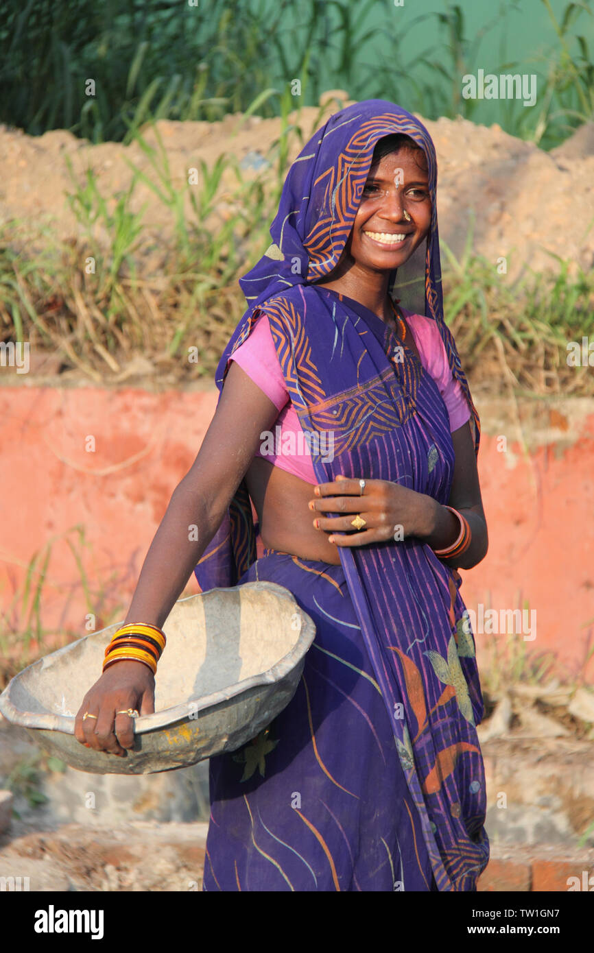 Manual worker standing at a construction site, India Stock Photo - Alamy