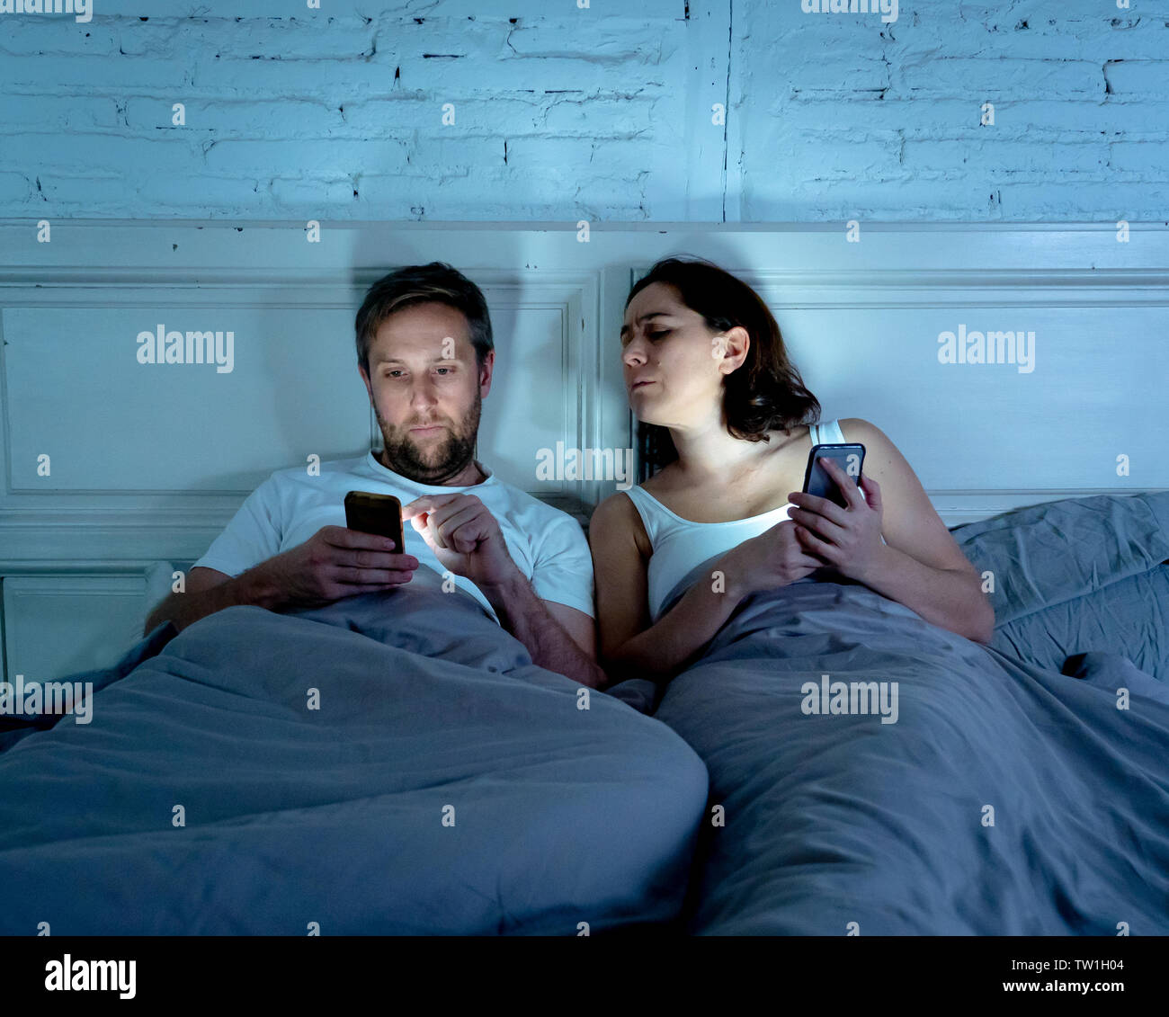 Lifestyle of mobile addicted man husband and angry frustrated wife ...