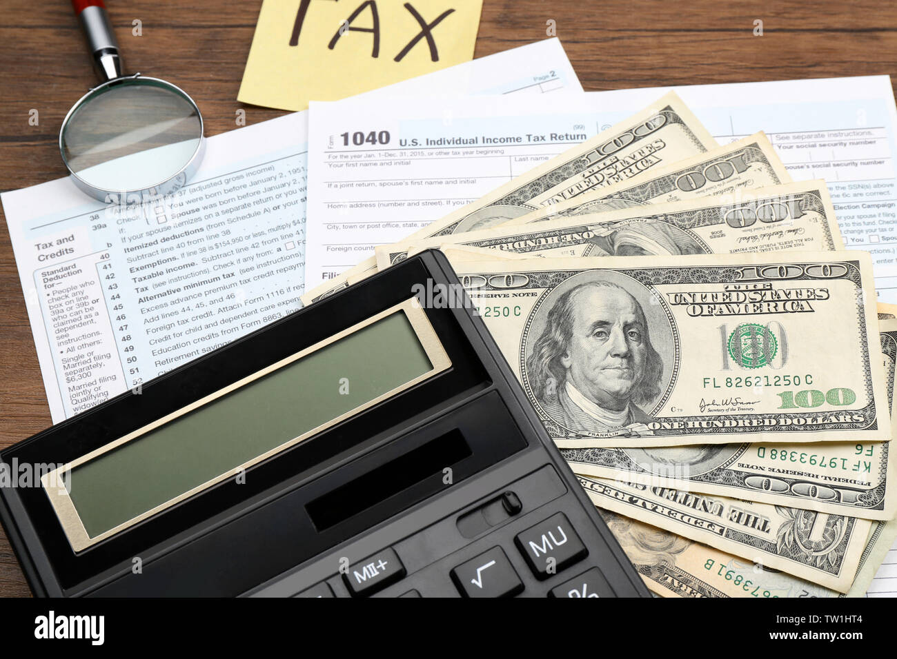 Calculator with money and documents, closeup. Tax concept Stock Photo ...