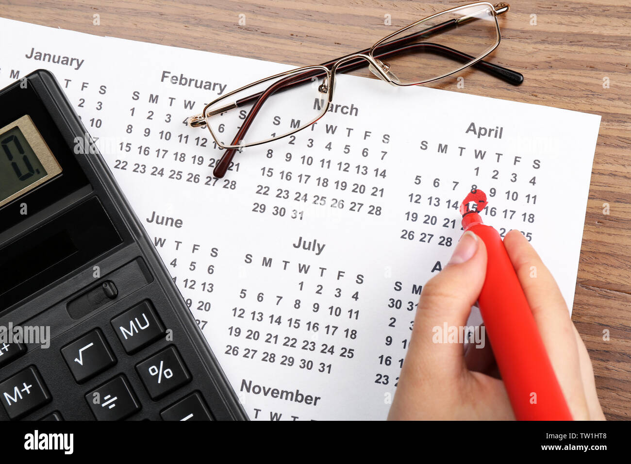Calendar checking hi-res stock photography and images - Alamy