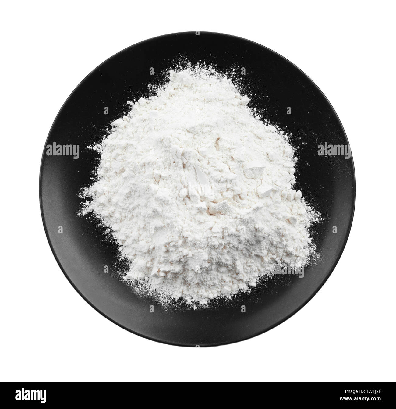 Plate with flour on white background Stock Photo - Alamy