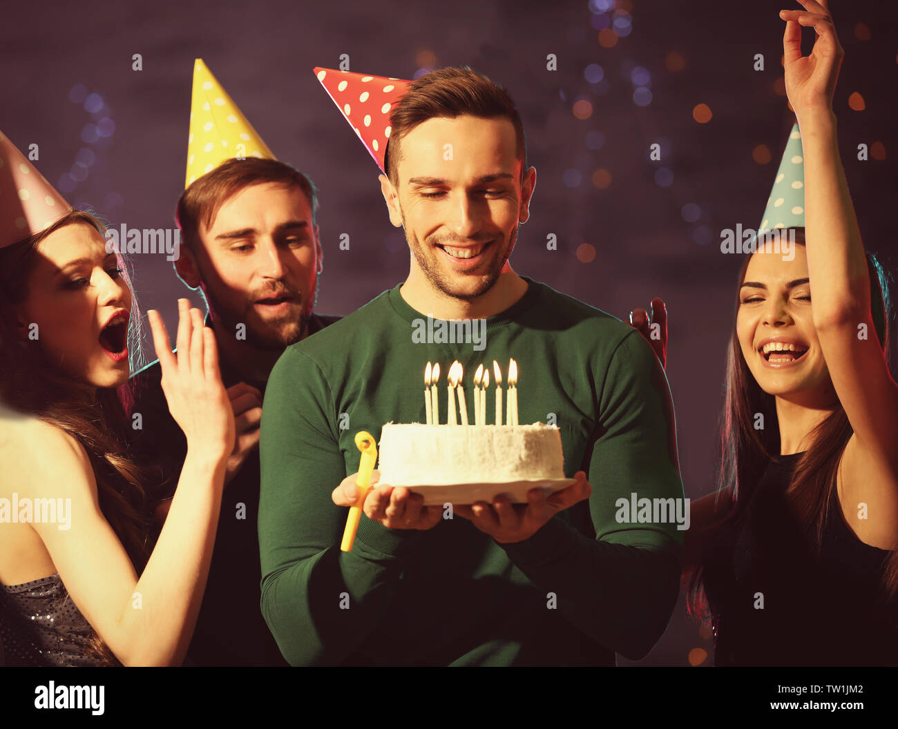 Friends having fun at birthday party in night club Stock Photo - Alamy