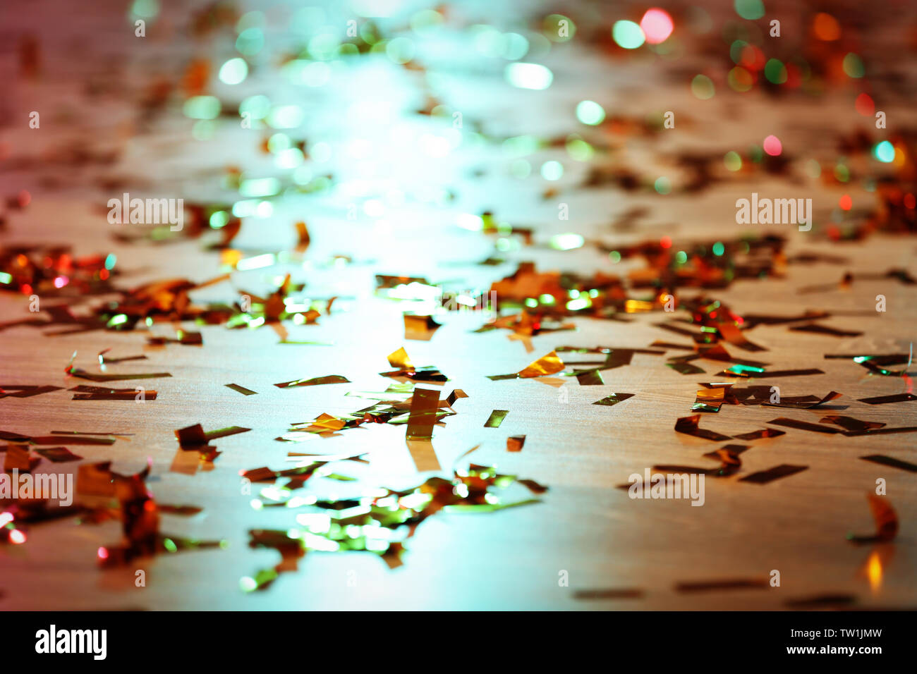 Floor in night club covered with confetti Stock Photo - Alamy