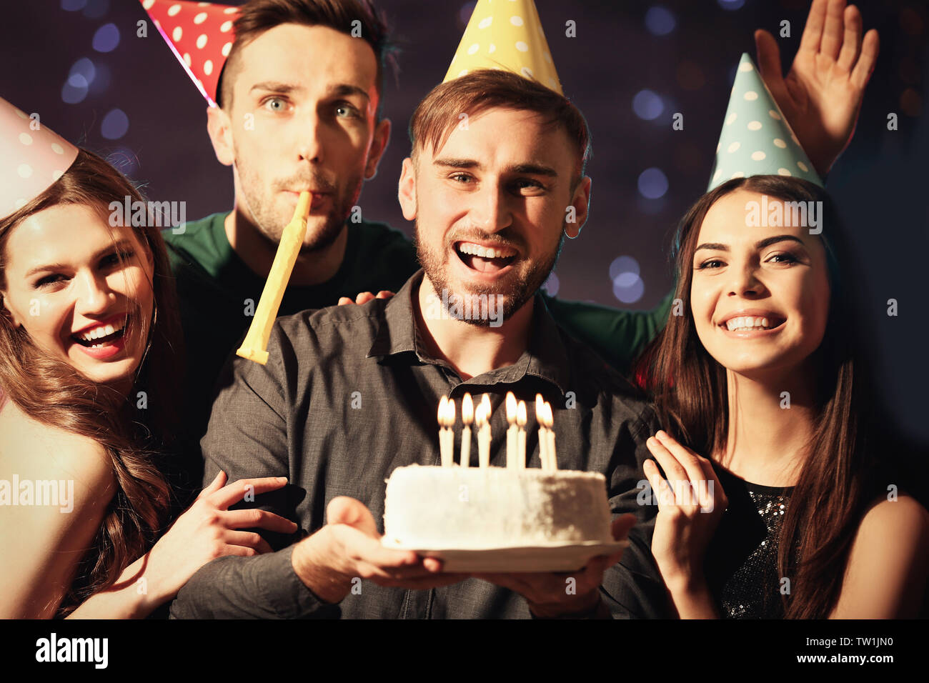 Friends having fun at birthday party in night club Stock Photo - Alamy