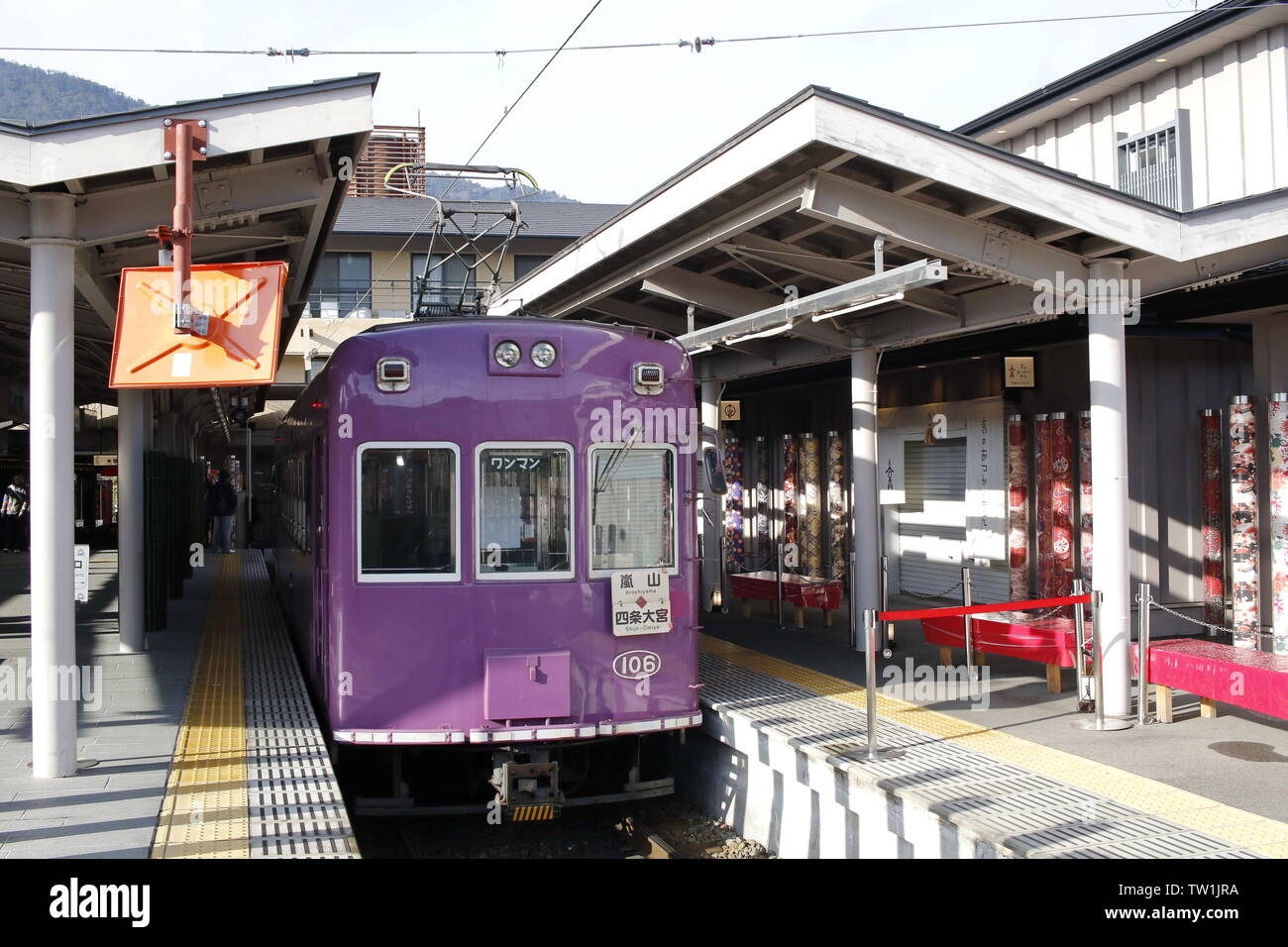 Purple tram train of Randen Arashiyama Line waiting at Shijo-Omiya ...