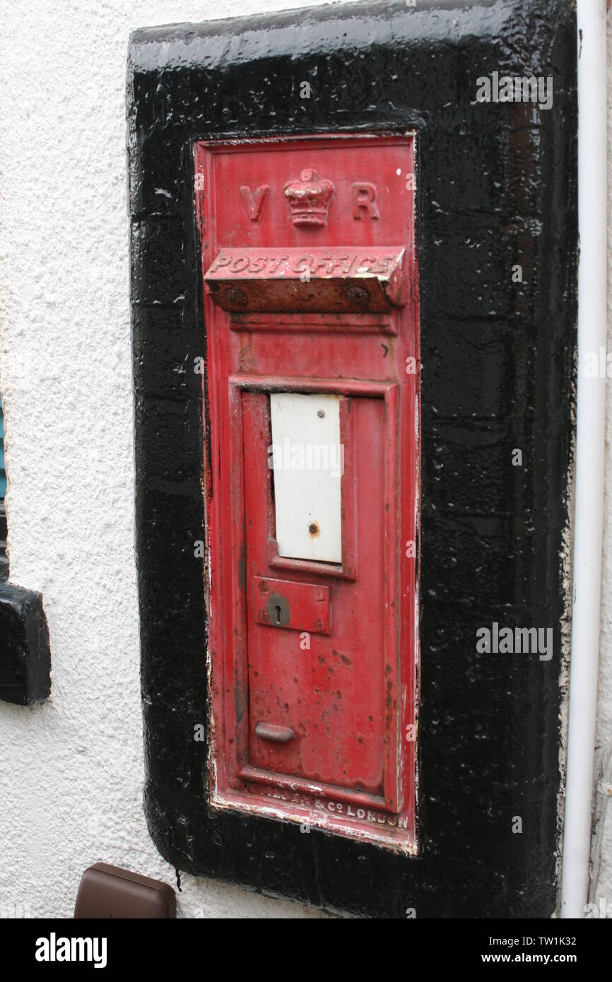 Victorian cast iron inset post box - decommissioned Stock Photo - Alamy