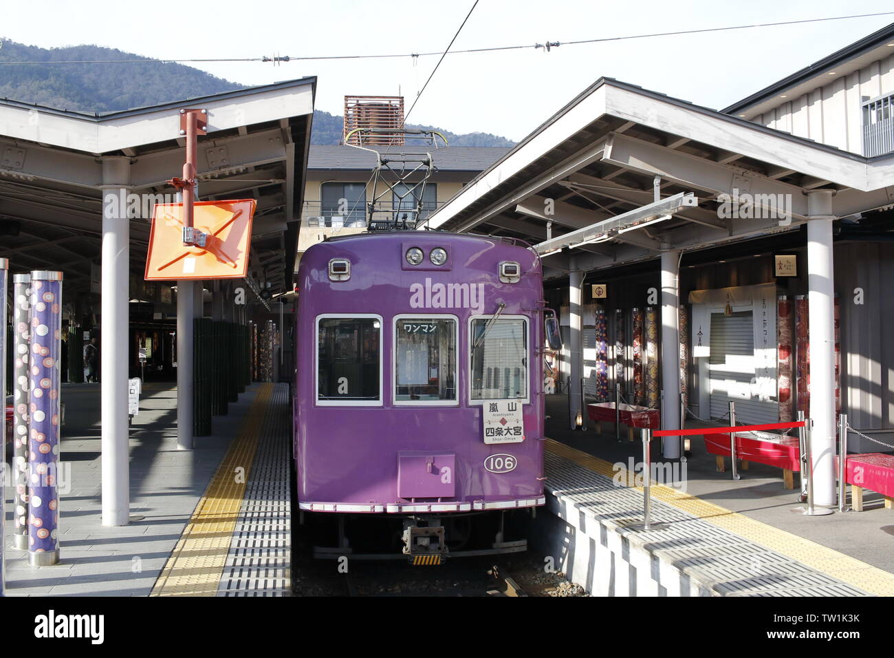 Purple tram train of Randen Arashiyama Line waiting at Shijo-Omiya ...