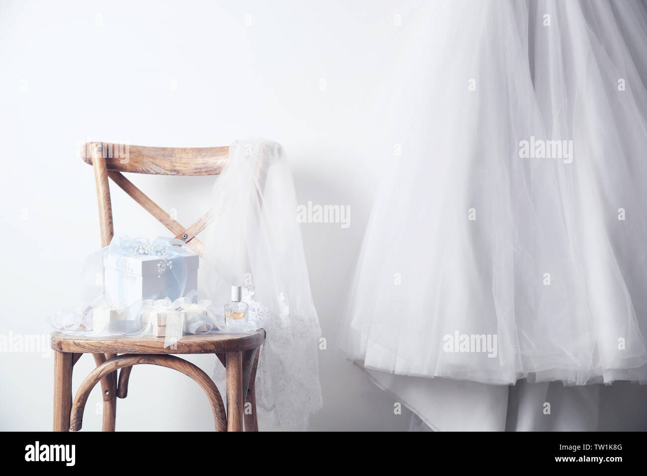 Wooden chair with gift boxes for wedding day Stock Photo - Alamy