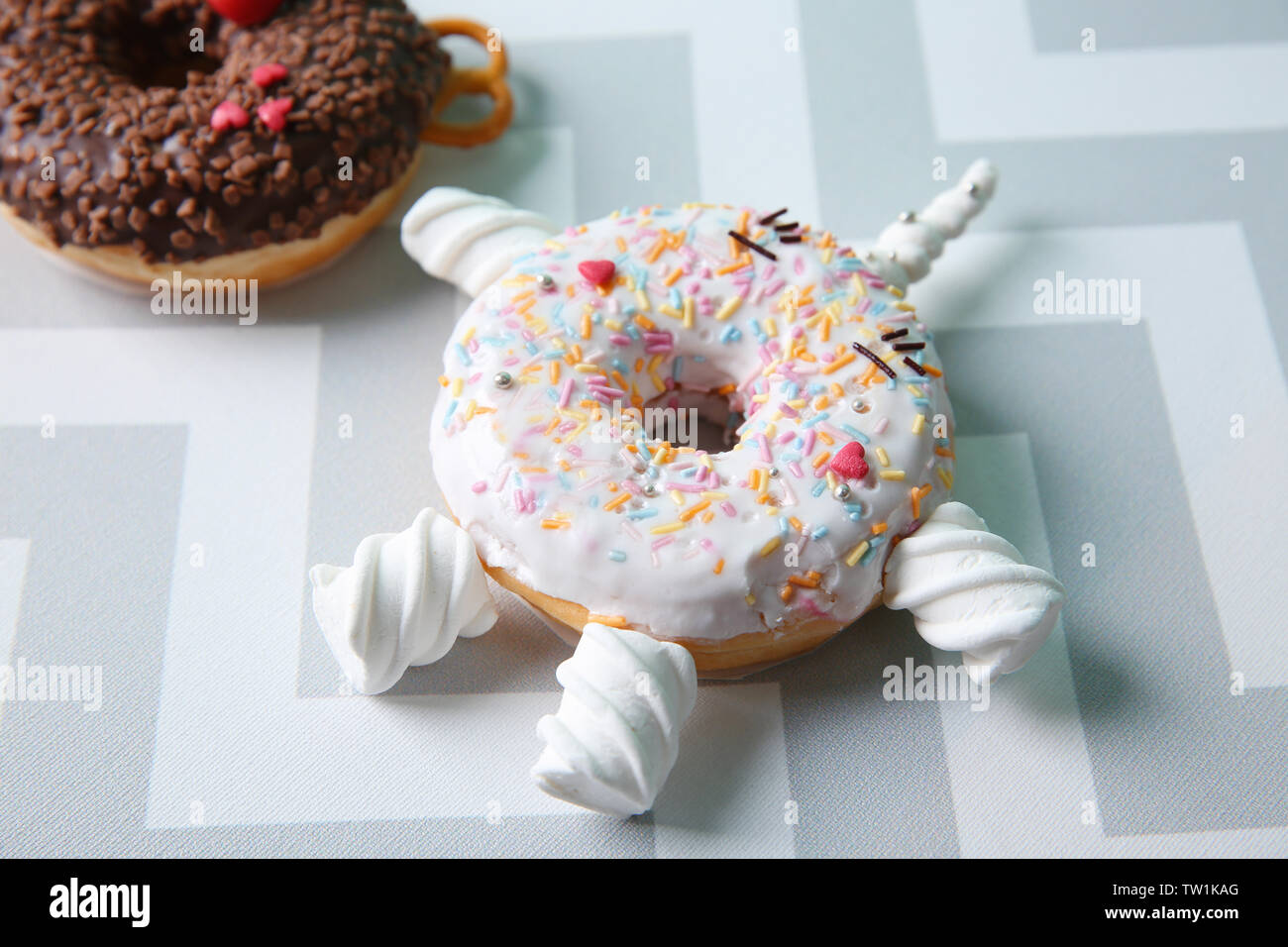 Creative donut on color background Stock Photo - Alamy