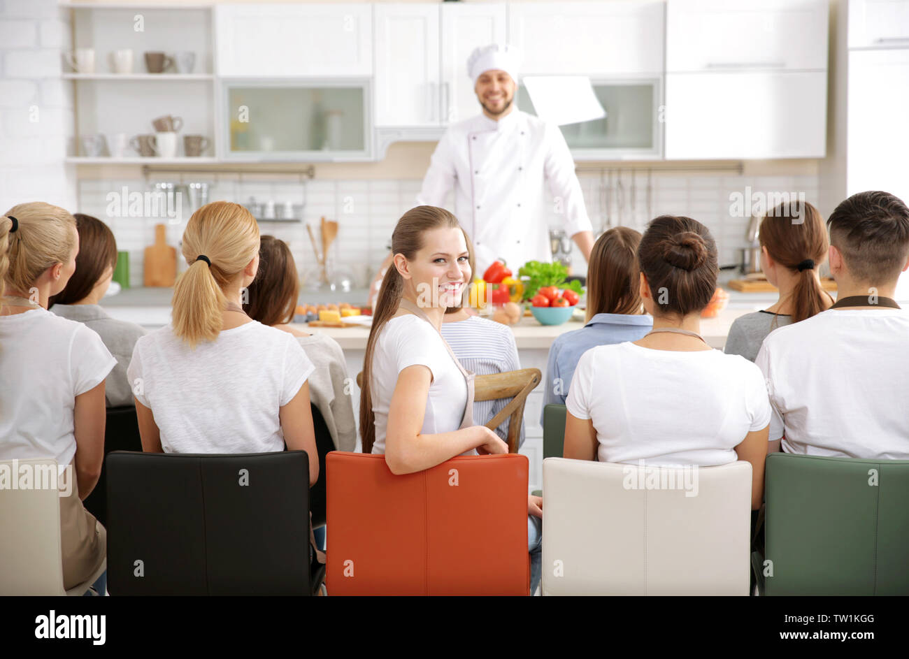 Group of people at cooking classes Stock Photo - Alamy