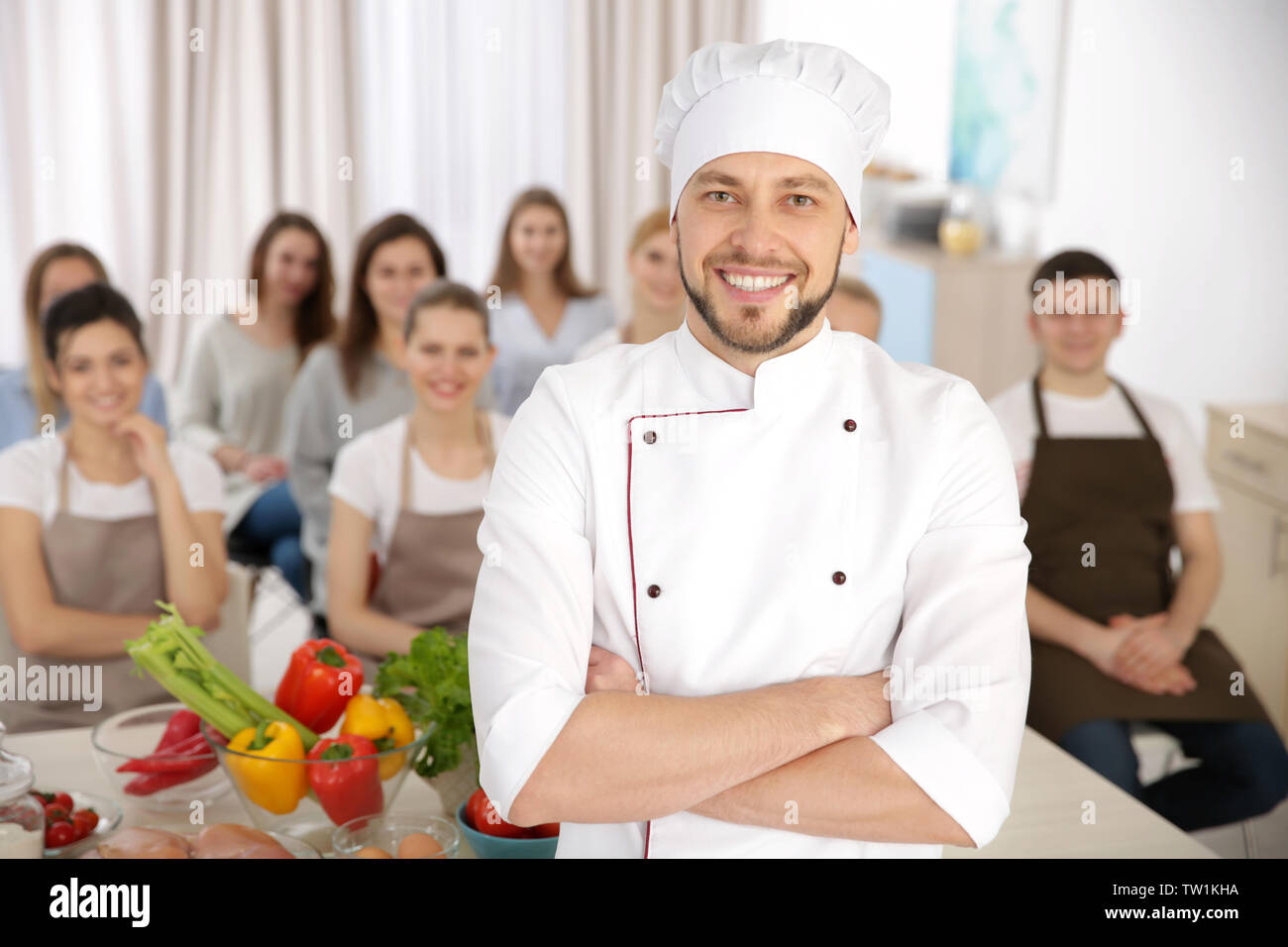 Male chef and group of people at cooking classes Stock Photo - Alamy