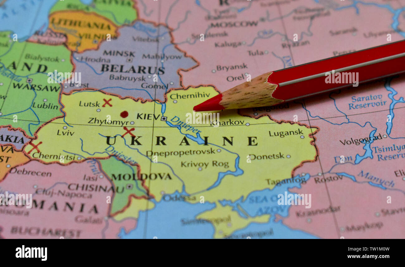 Picture of a red color pencil on a map Stock Photo - Alamy