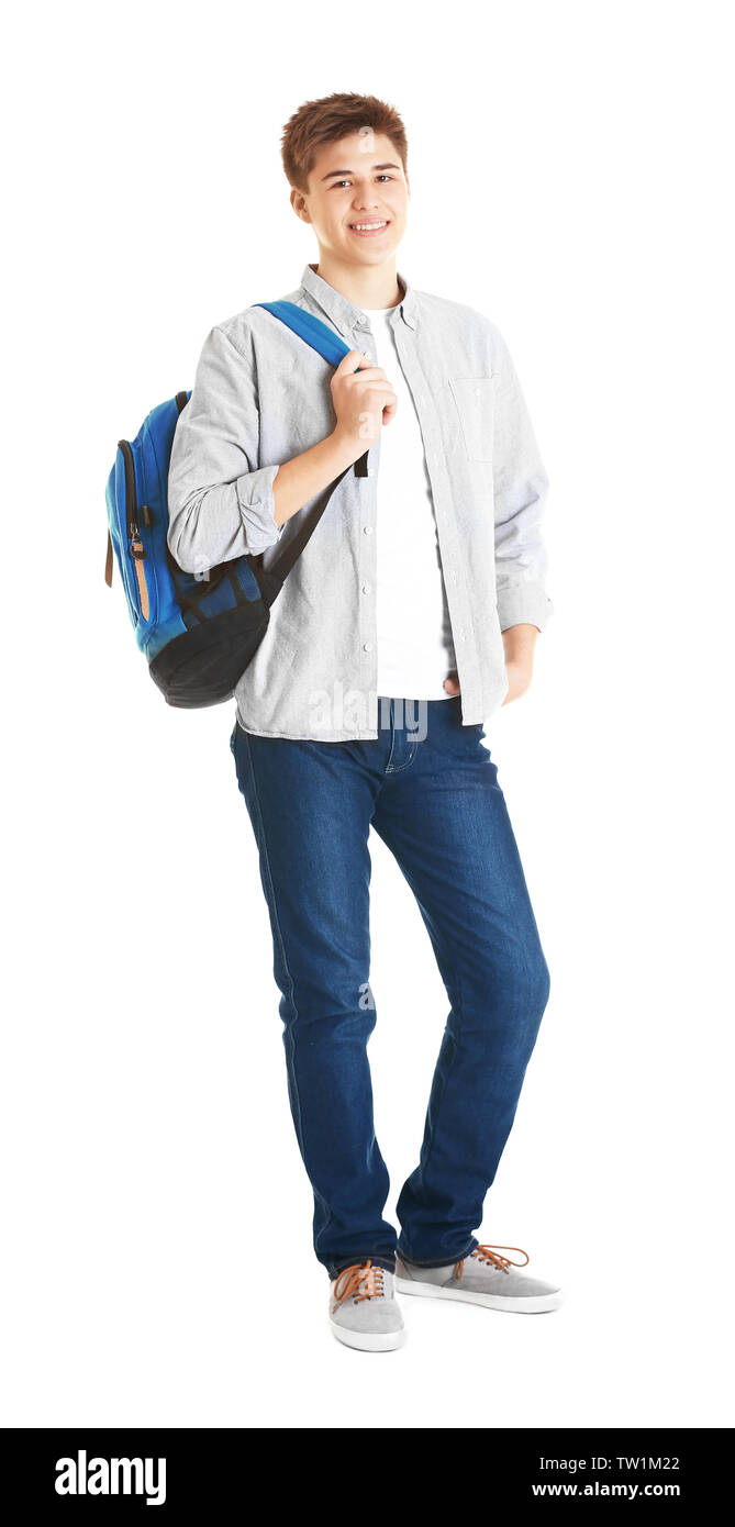 Teenager with backpack standing on white background Stock Photo - Alamy