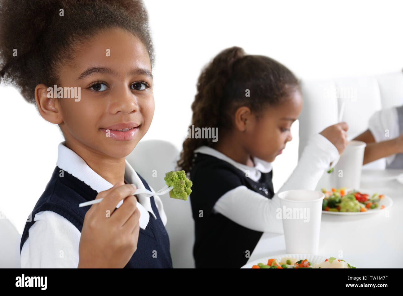 Ethnic kids dining hi-res stock photography and images - Alamy