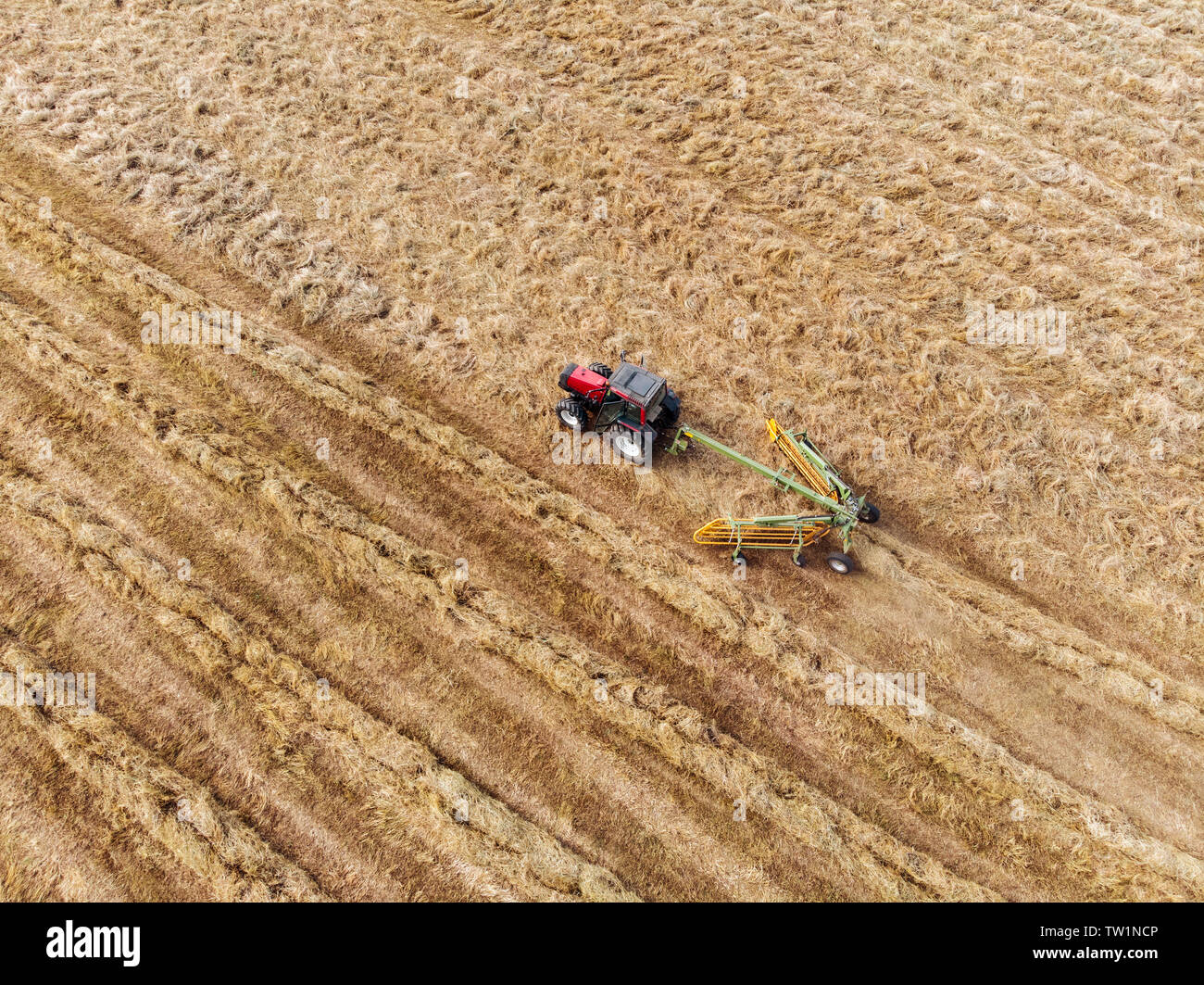 Nature and landscape, aerial view of fields with tractor with round ...