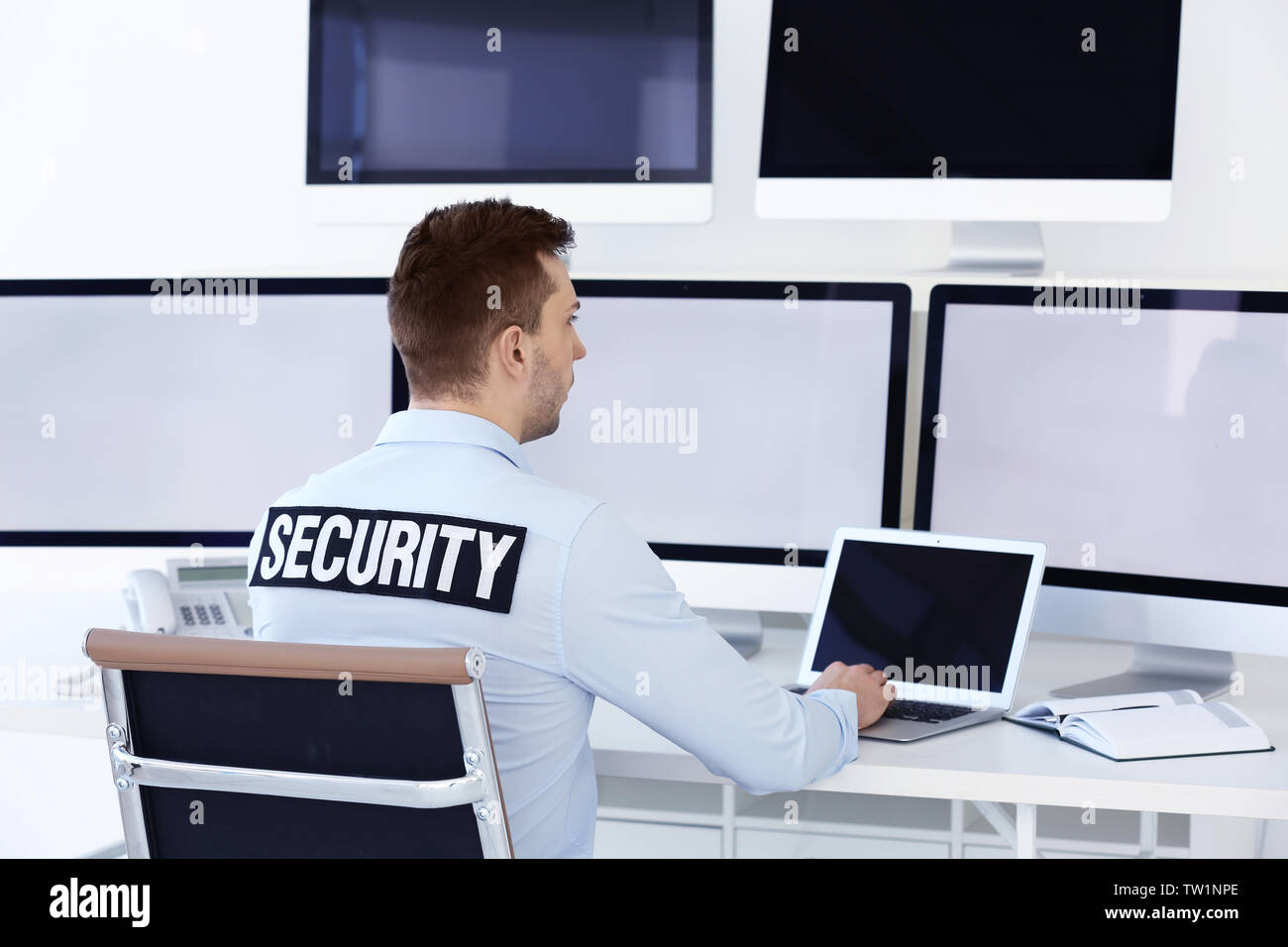 Handsome guard in uniform hi-res stock photography and images - Alamy