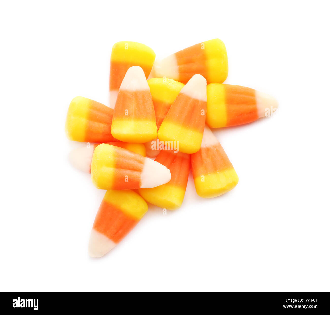 Colorful Halloween candy corns on white background Stock Photo - Alamy